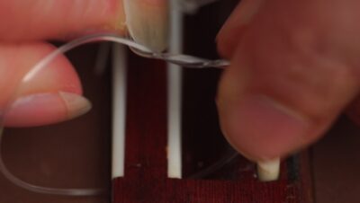 How to change strings on classical guitar