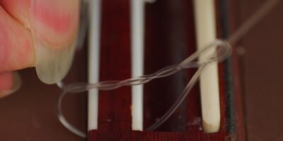 How to change strings on classical guitar