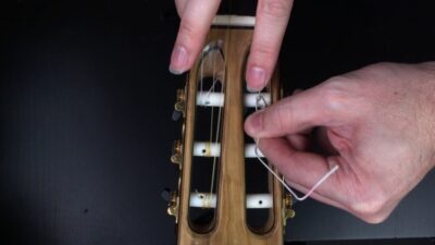How to change strings on classical guitar